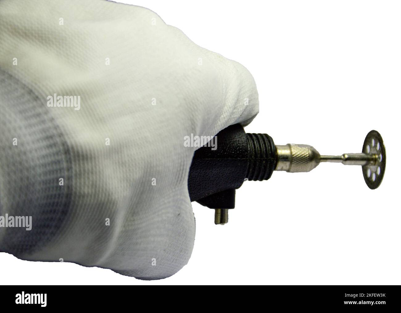Hand holding a small grinder (with clipping path Stock Photo - Alamy