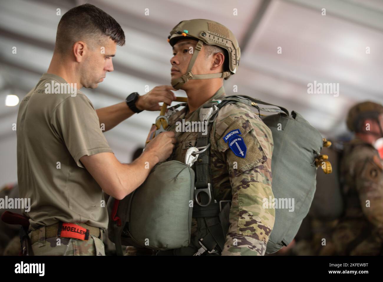 A U.S. Army Jumpmaster conducts a Jumpmaster Personel Inspection (JMPI ...