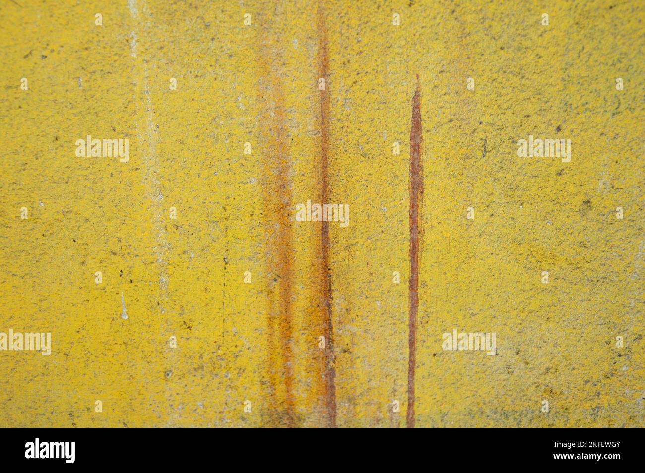 The yellow walls are dirty and old. use as wallpaper Stock Photo - Alamy