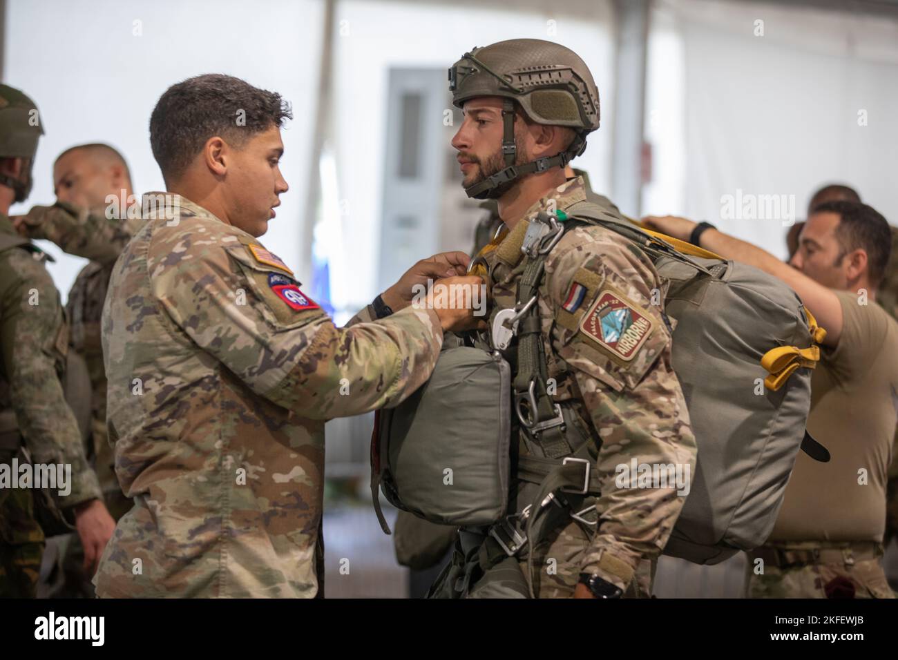 A U.S. Army Jumpmaster conducts a Jumpmaster Personel Inspection (JMPI ...