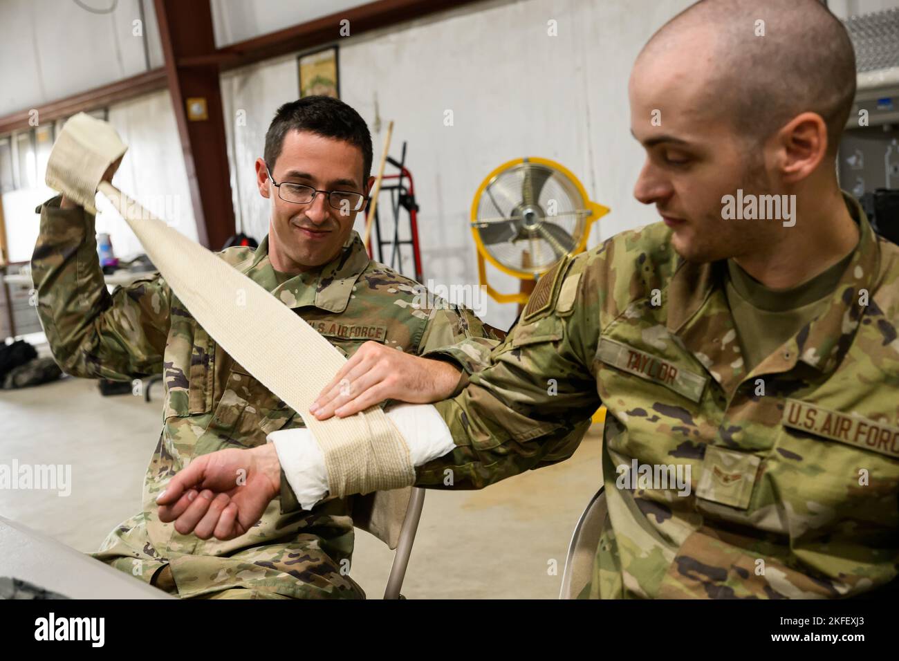 Left, Staff Sgt. Christopher Nielson and Airman 1st Class Matthew ...