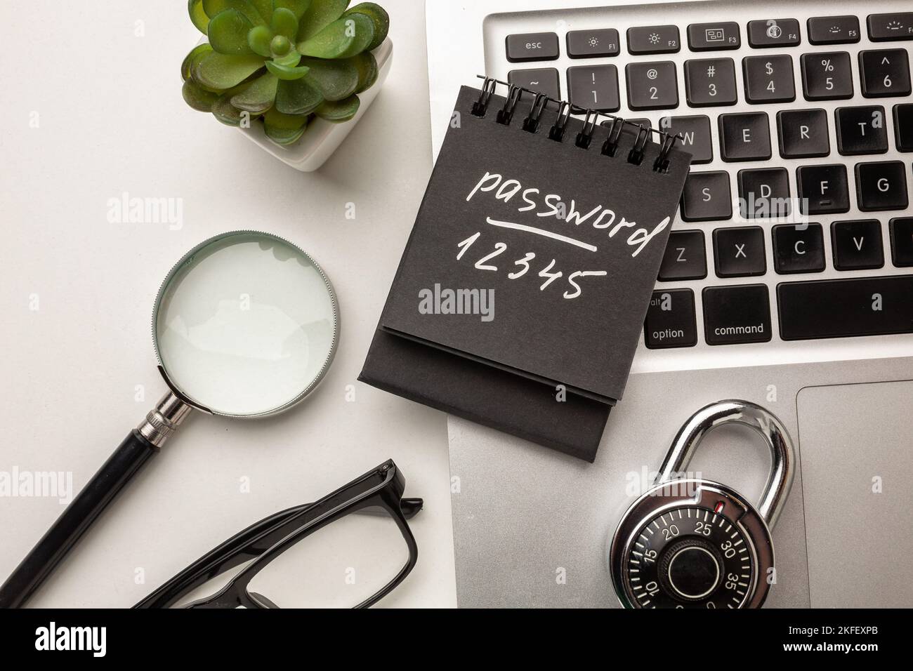 Strong steel coded lock on a laptop keyboard. IT security policies ...