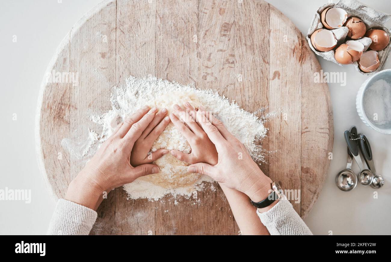 .Baking, learning and family hands of a mother and girl teaching pizza ...