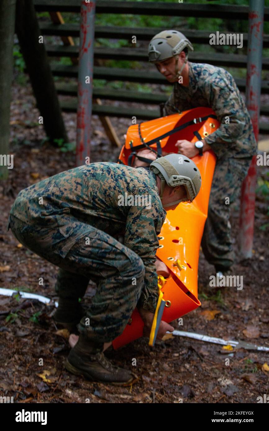 U.S. Marines with 2d Marine Division carry a sled litter during a ...