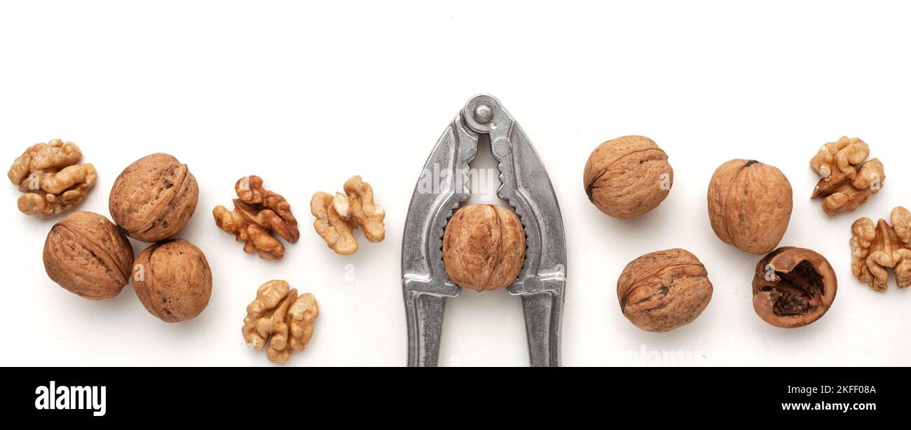 nutshell with walnuts, shell on a white background Stock Photo - Alamy