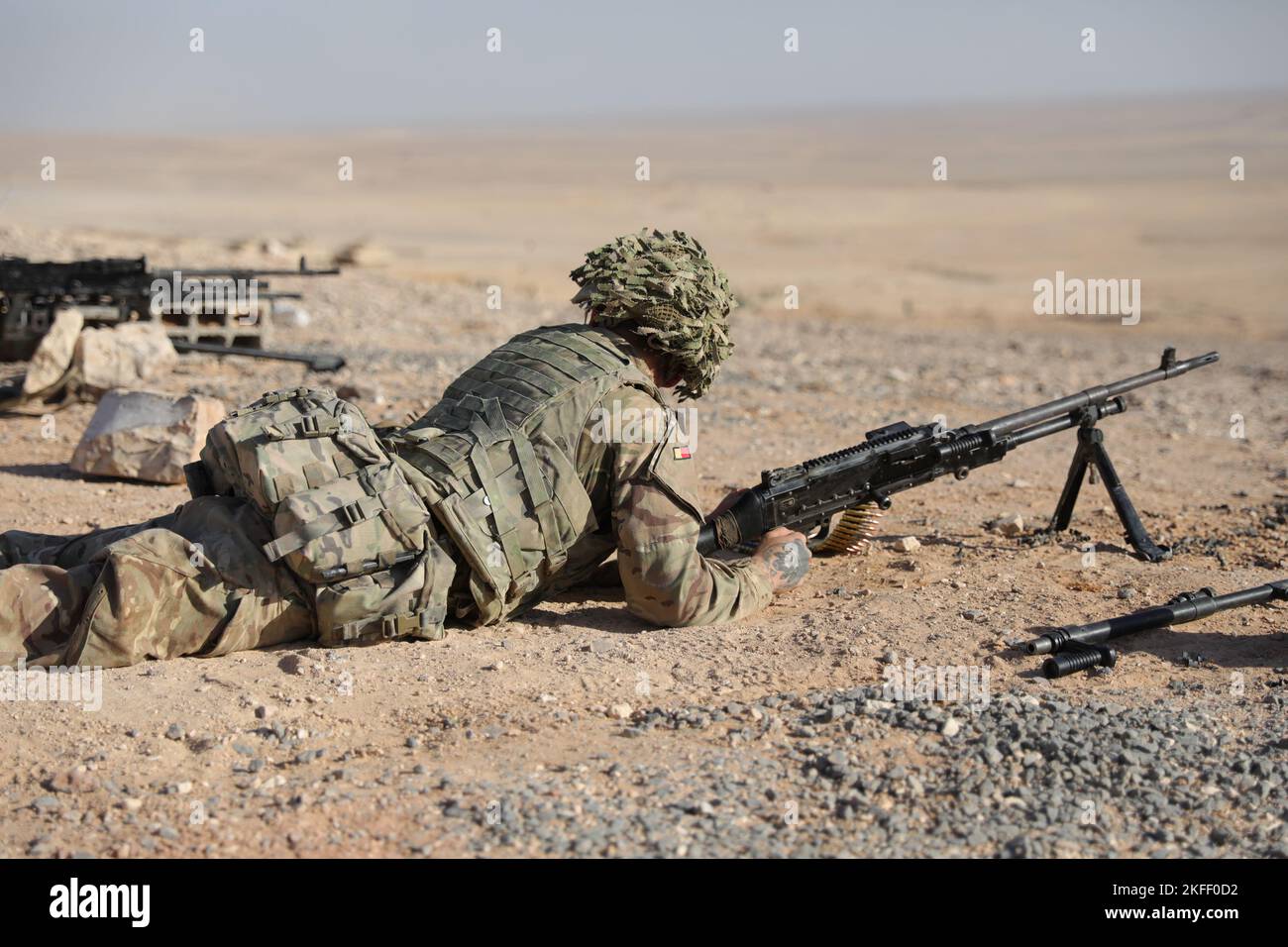 Soldiers from the British Army conduct a live-fire exercise with their ...