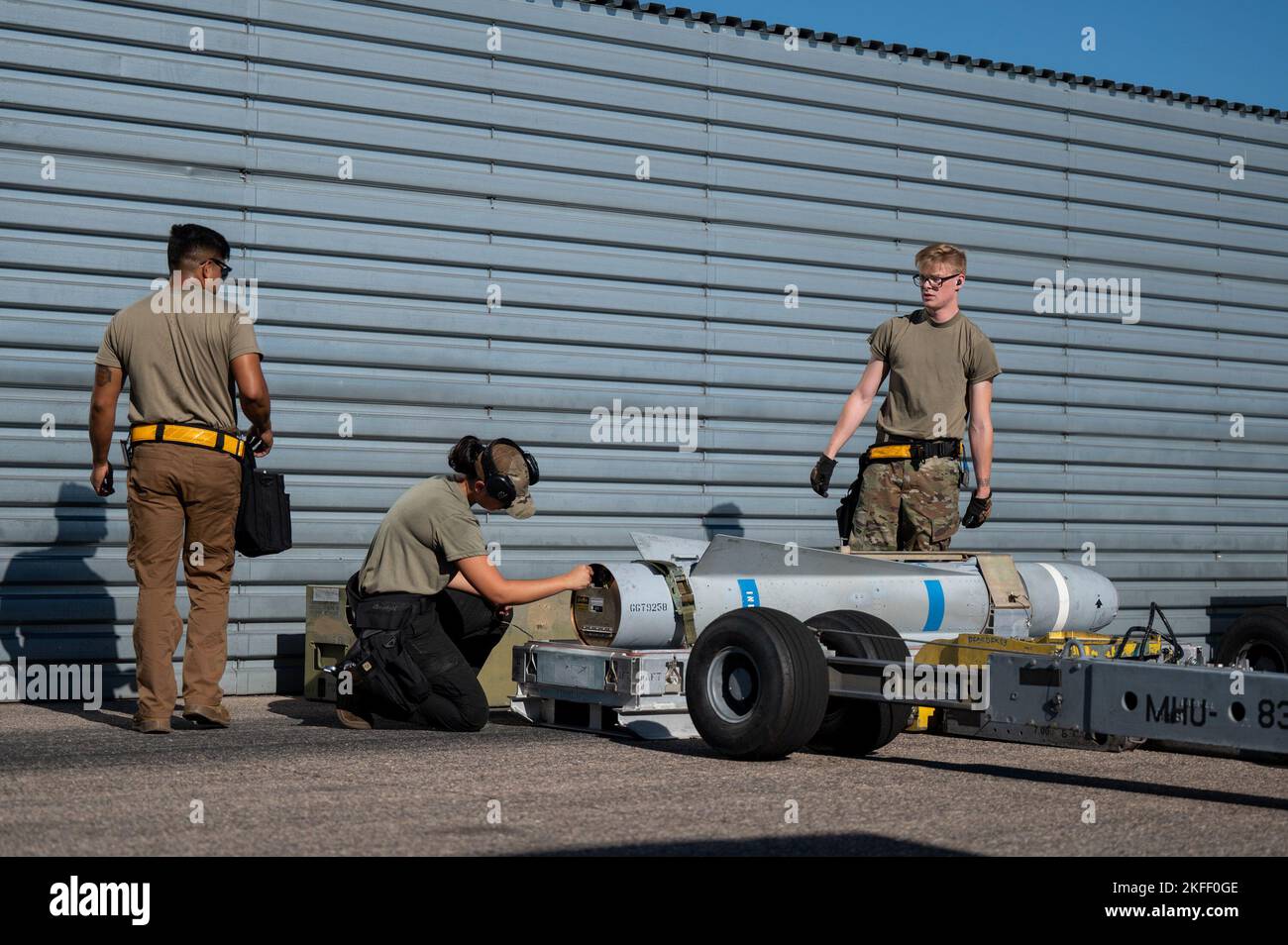 A 357th Fighter Generation Squadron weapons load crew team inspects an ...