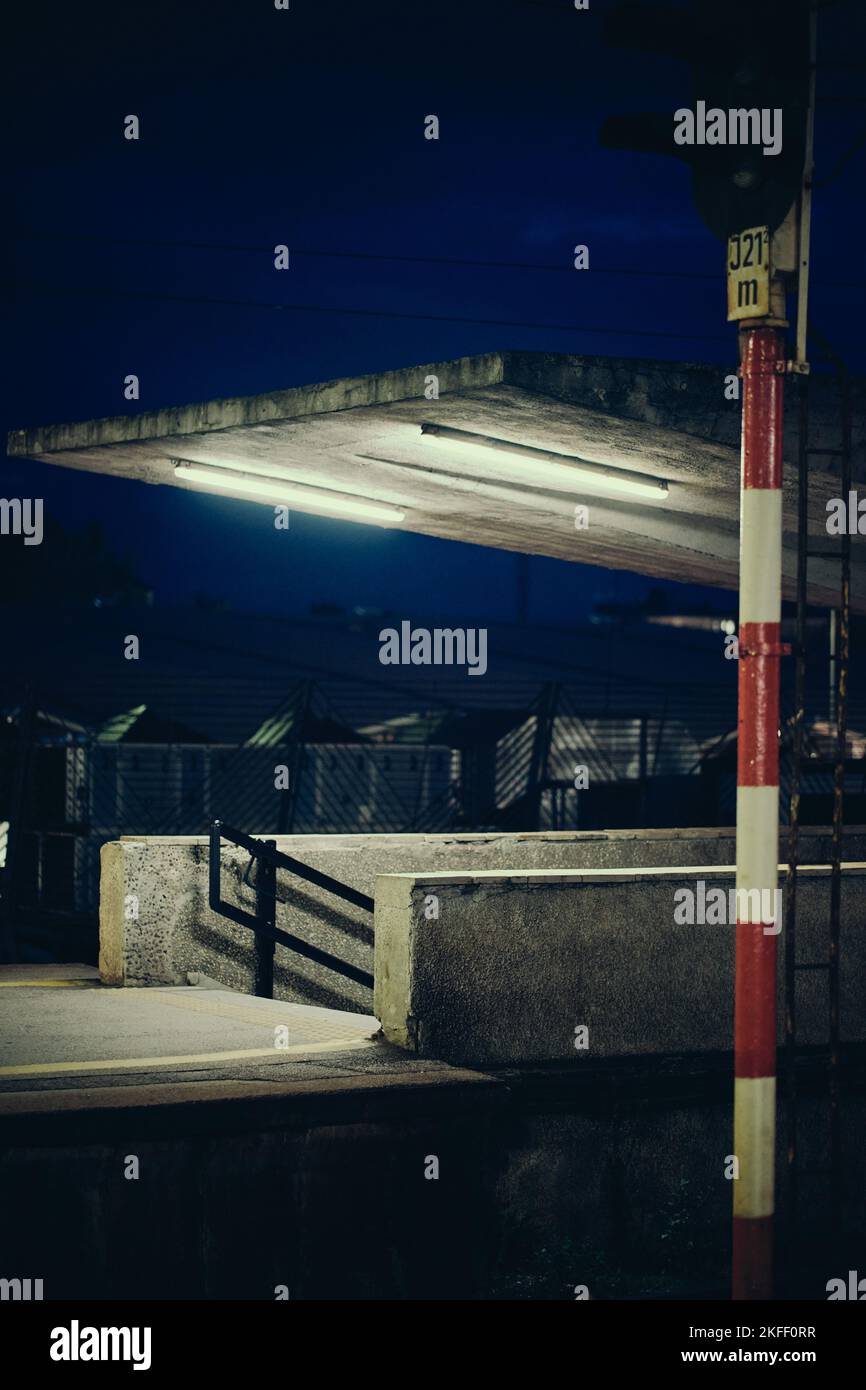 A vertical shot of a staircase entrance in the nighttime Stock Photo ...