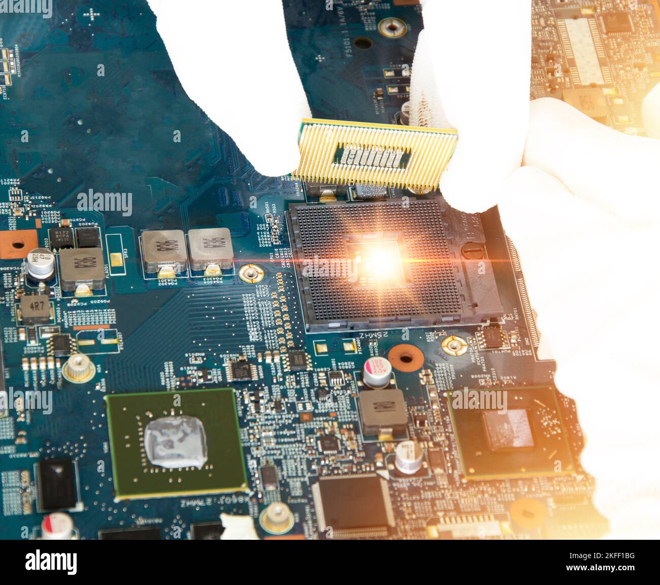 image of a mechanic repairing computer motherboard, electronic ...