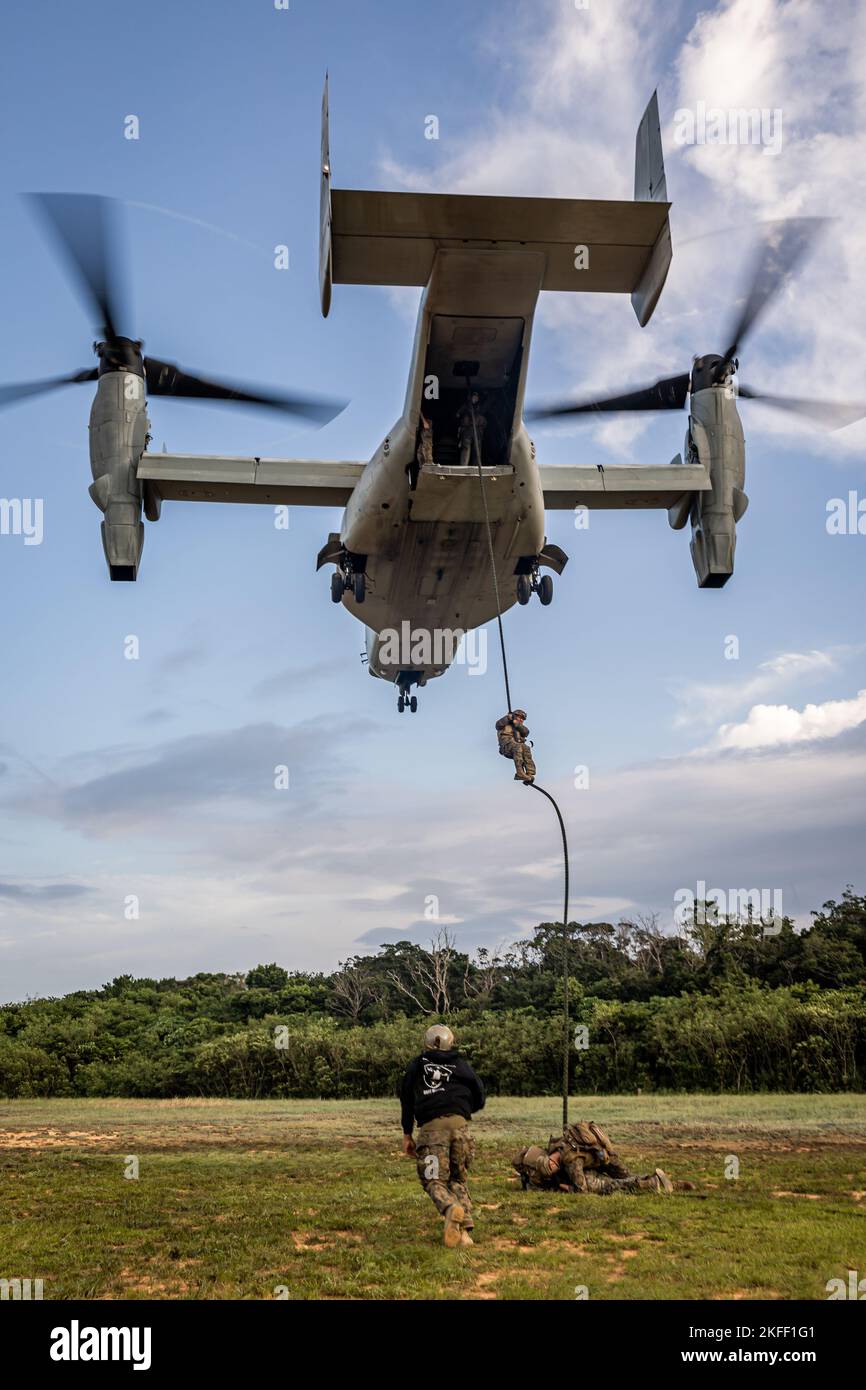 U.S. Marines with III Marine Expeditionary Force (MEF) fast rope from ...