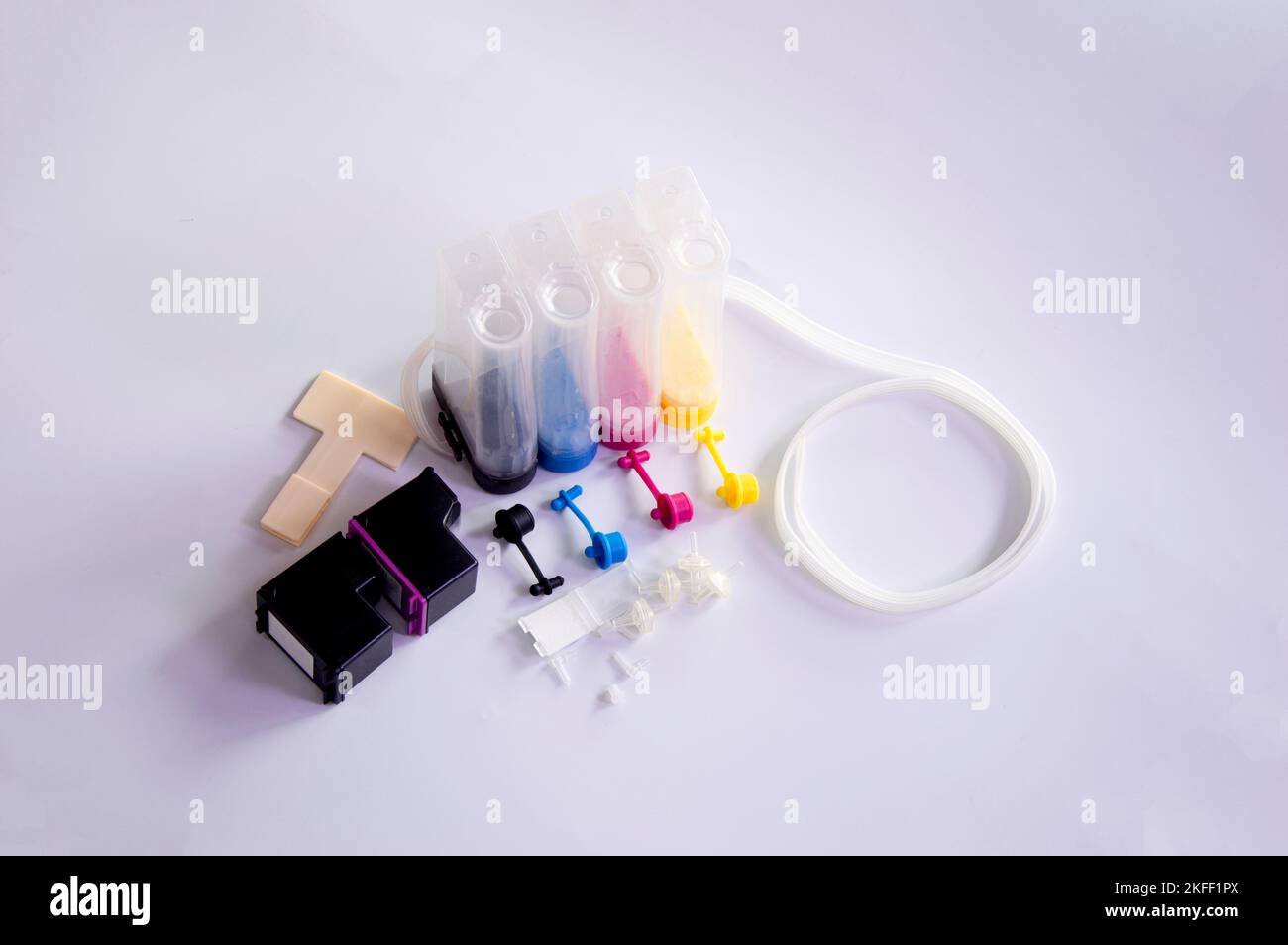 Image of equipment for creating ink tanks for printers Stock Photo - Alamy