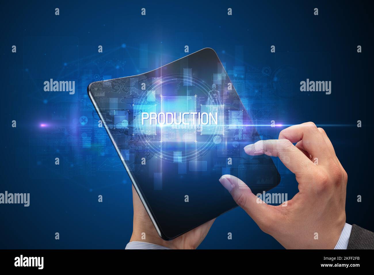 Businessman holding a foldable smartphone Stock Photo - Alamy