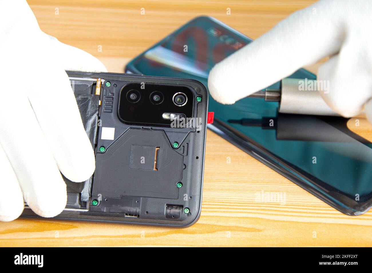 Image of a smartphone removed from the back, smartphone repair Stock ...