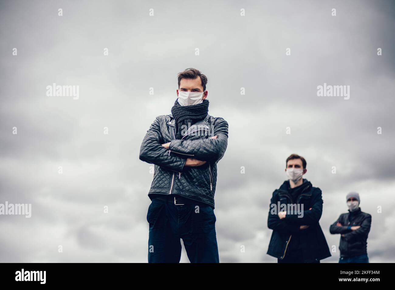people standing at a safe distance on a city street Stock Photo - Alamy