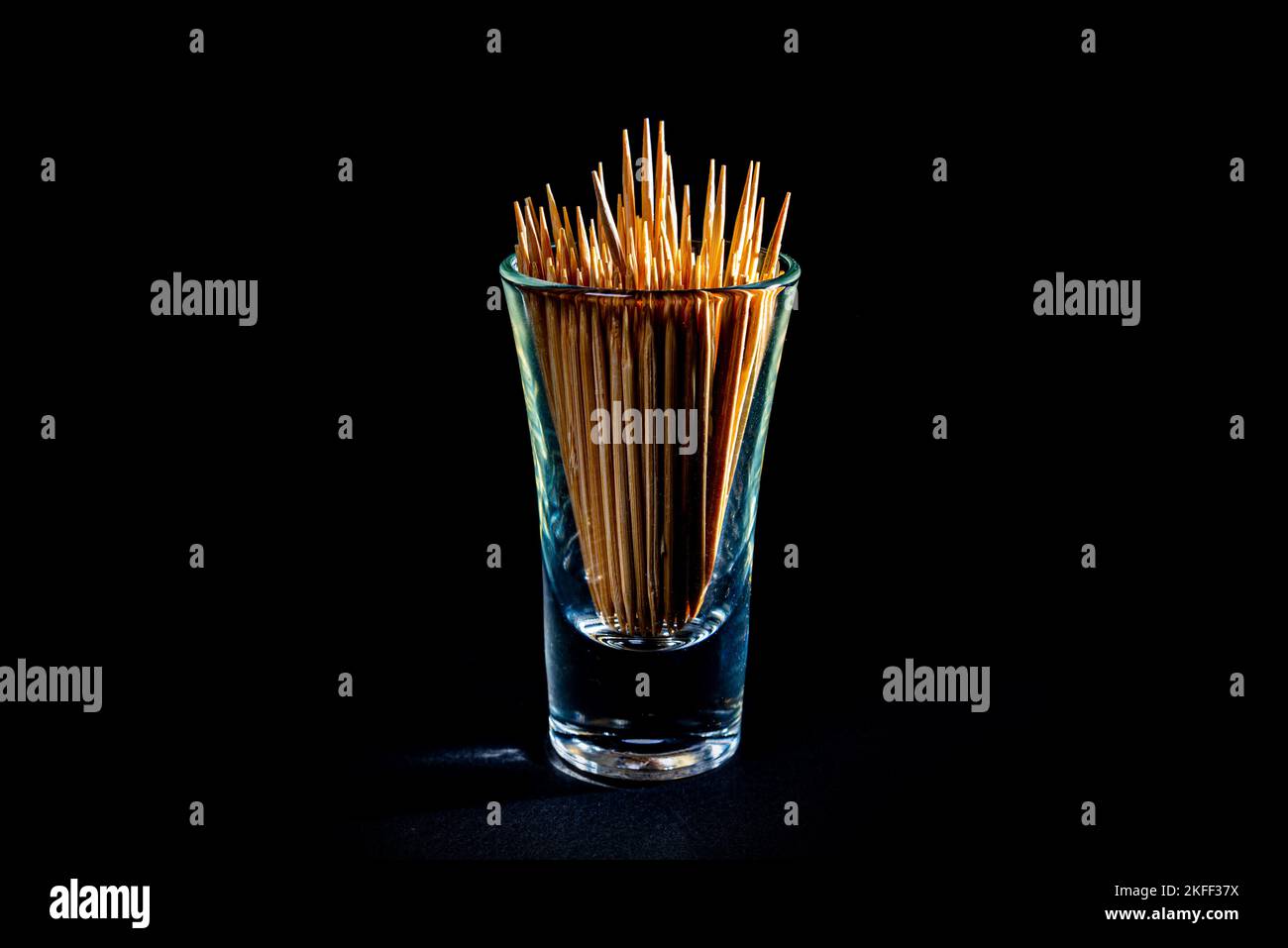 bamboo wooden toothpicks in glass jar, wine glass. in bucket ...