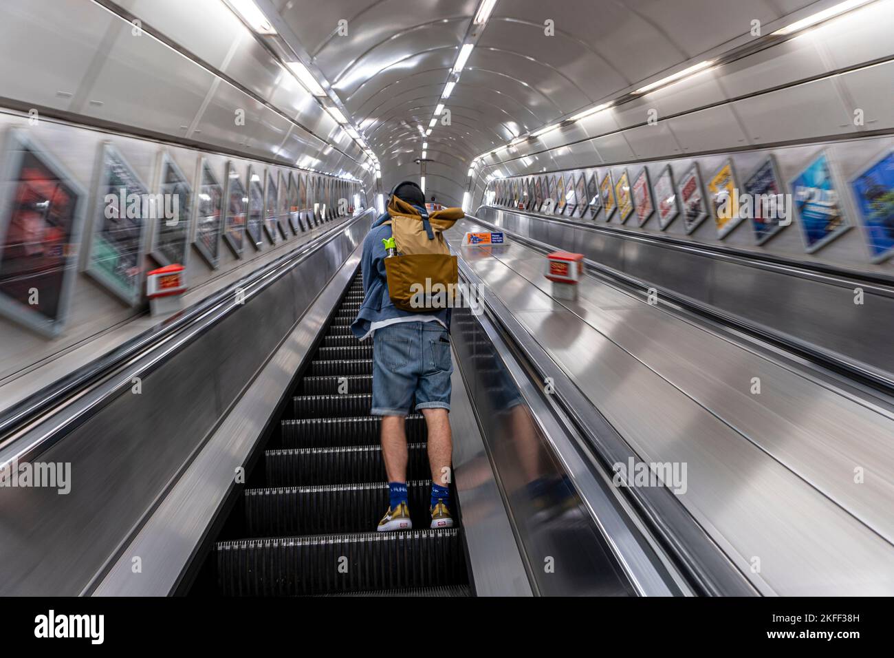Single traveller ascending escalator hi-res stock photography and ...