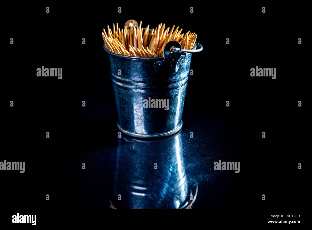 bamboo wooden toothpicks in glass jar, wine glass. in bucket ...