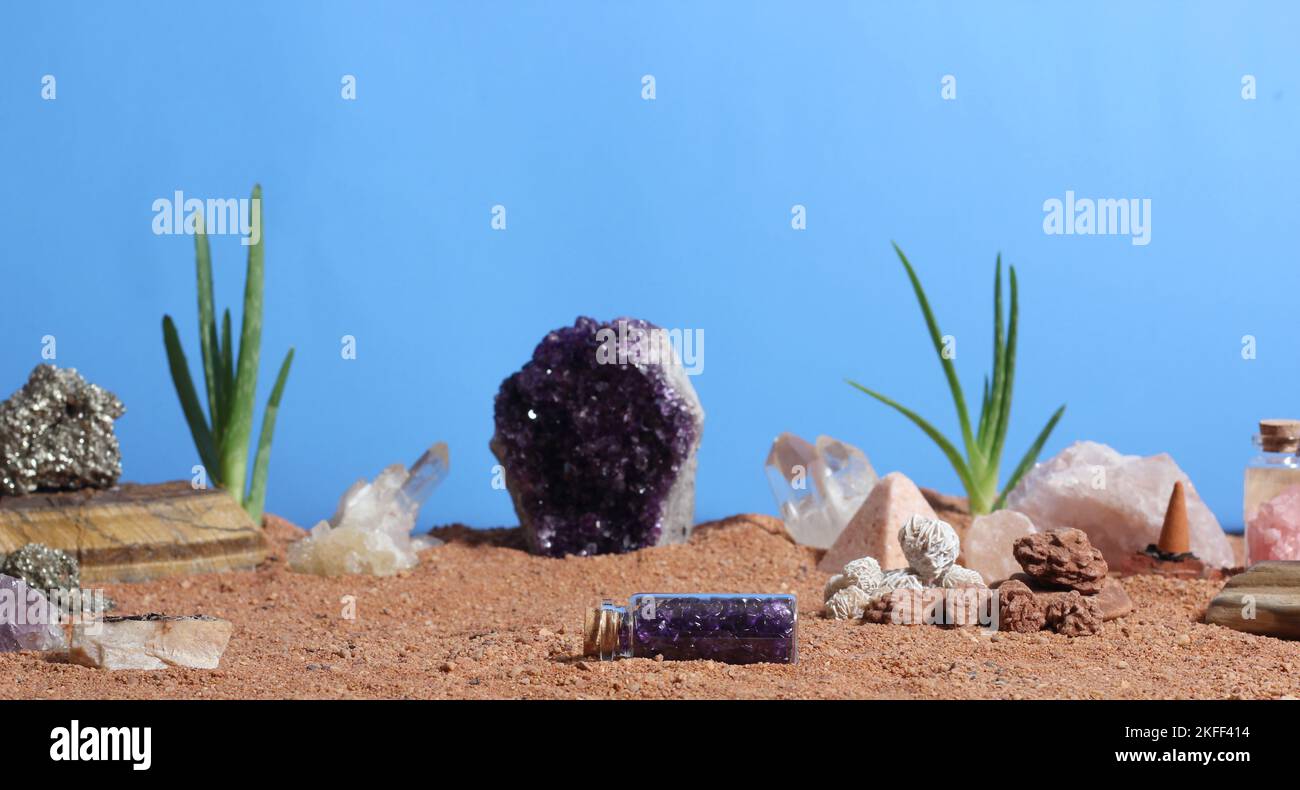 Chakra Stones and Flowers on Australian Red Sand Meditation Altar Stock ...