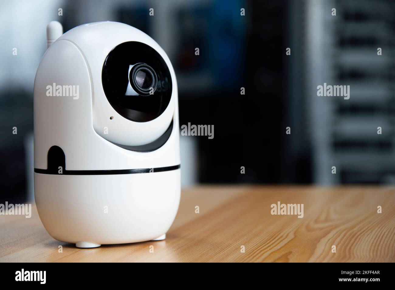 White IP camera placed on wooden floor Stock Photo - Alamy