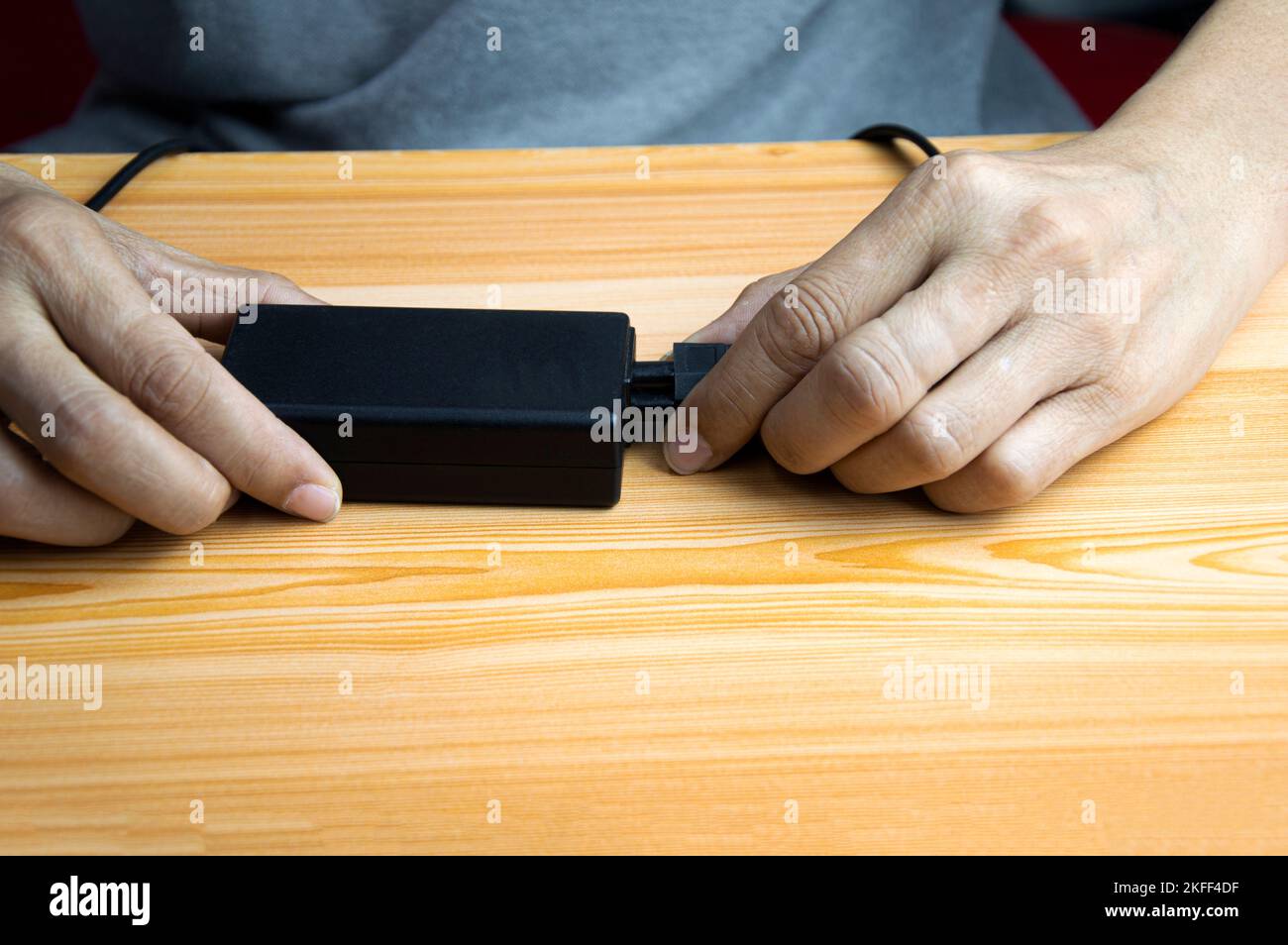 Plugging electrical power cable charge hi-res stock photography and ...