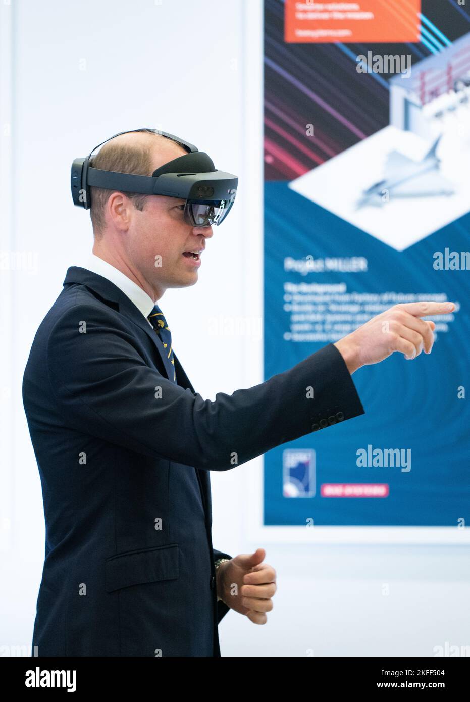 The Prince of Wales wearing a virtual reality headset in the BAE ...