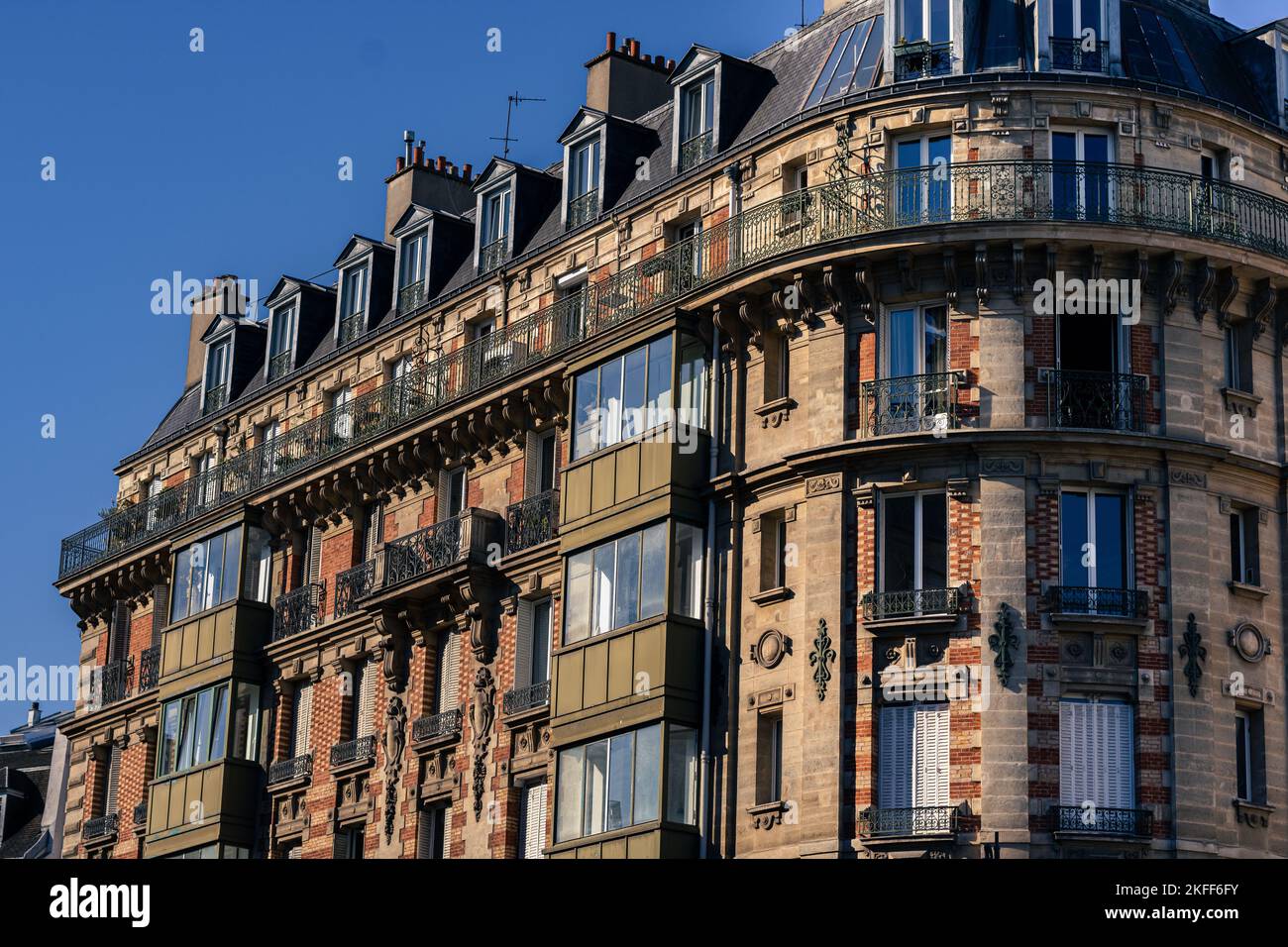 The facades of a modernized medieval building before the blue sky in ...
