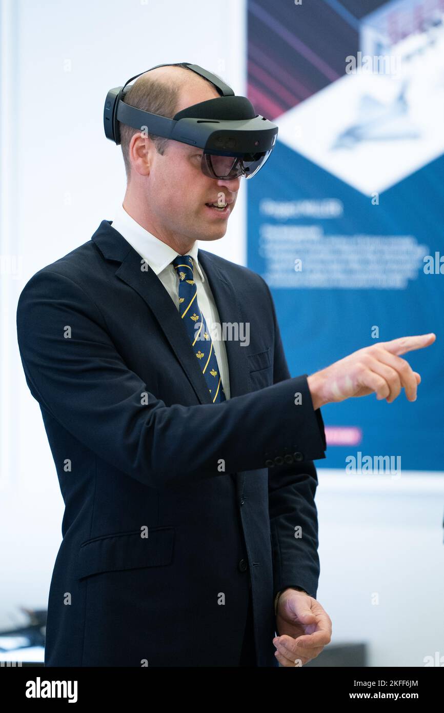 The Prince of Wales wearing a virtual reality headset in the BAE ...
