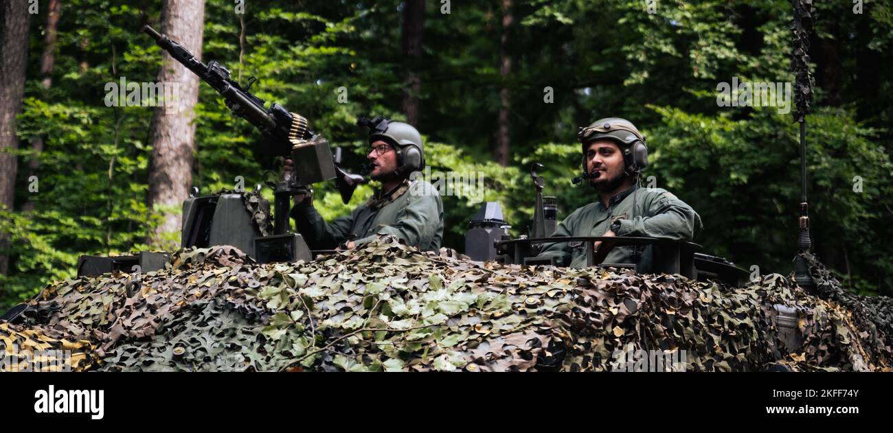 Italian soldiers with 4th Tank Regiment, Garibaldi Brigade scan the ...