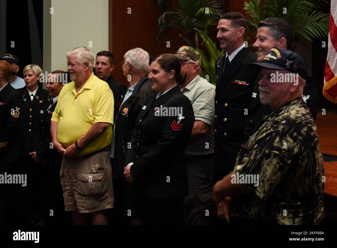 Members of the U.S. Navy Band Country Current meet audience members and ...