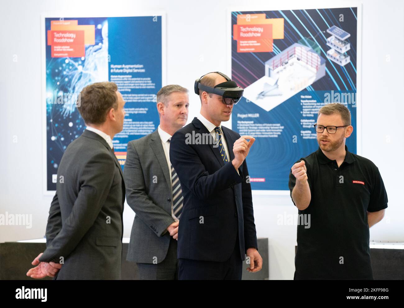 The Prince of Wales wearing a virtual reality headset in the BAE ...