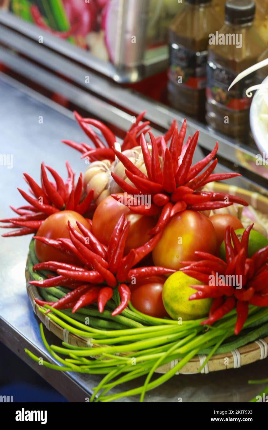 chili, potato, lemon display in the ho thi ky street, ho chi minh city ...