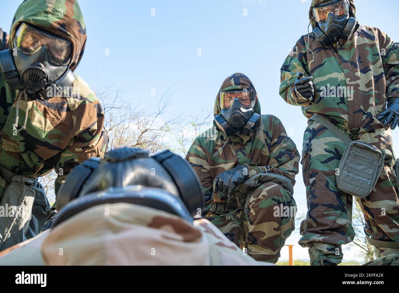 Airmen perform Self-Aid Buddy Care, during a chemical, biological ...