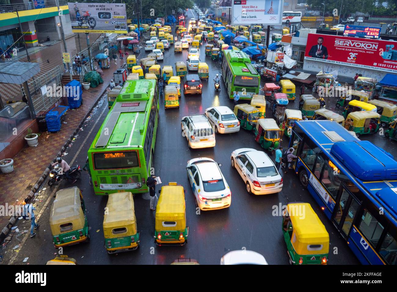 NEW DELHI - SEPTEMBER 16: Street life, traffic jam with cars, public ...