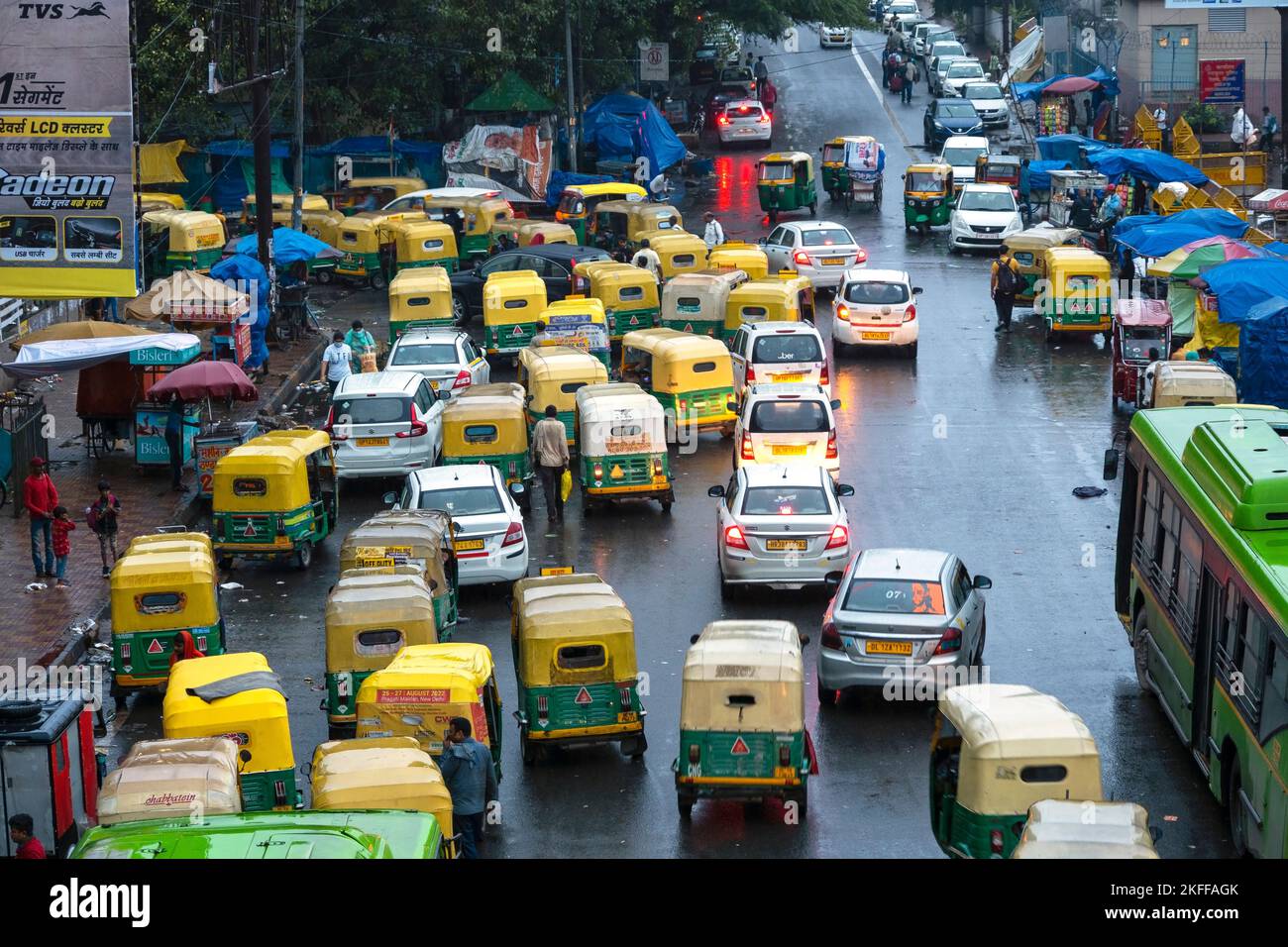 NEW DELHI - SEPTEMBER 16: Street life, traffic jam with cars, public ...