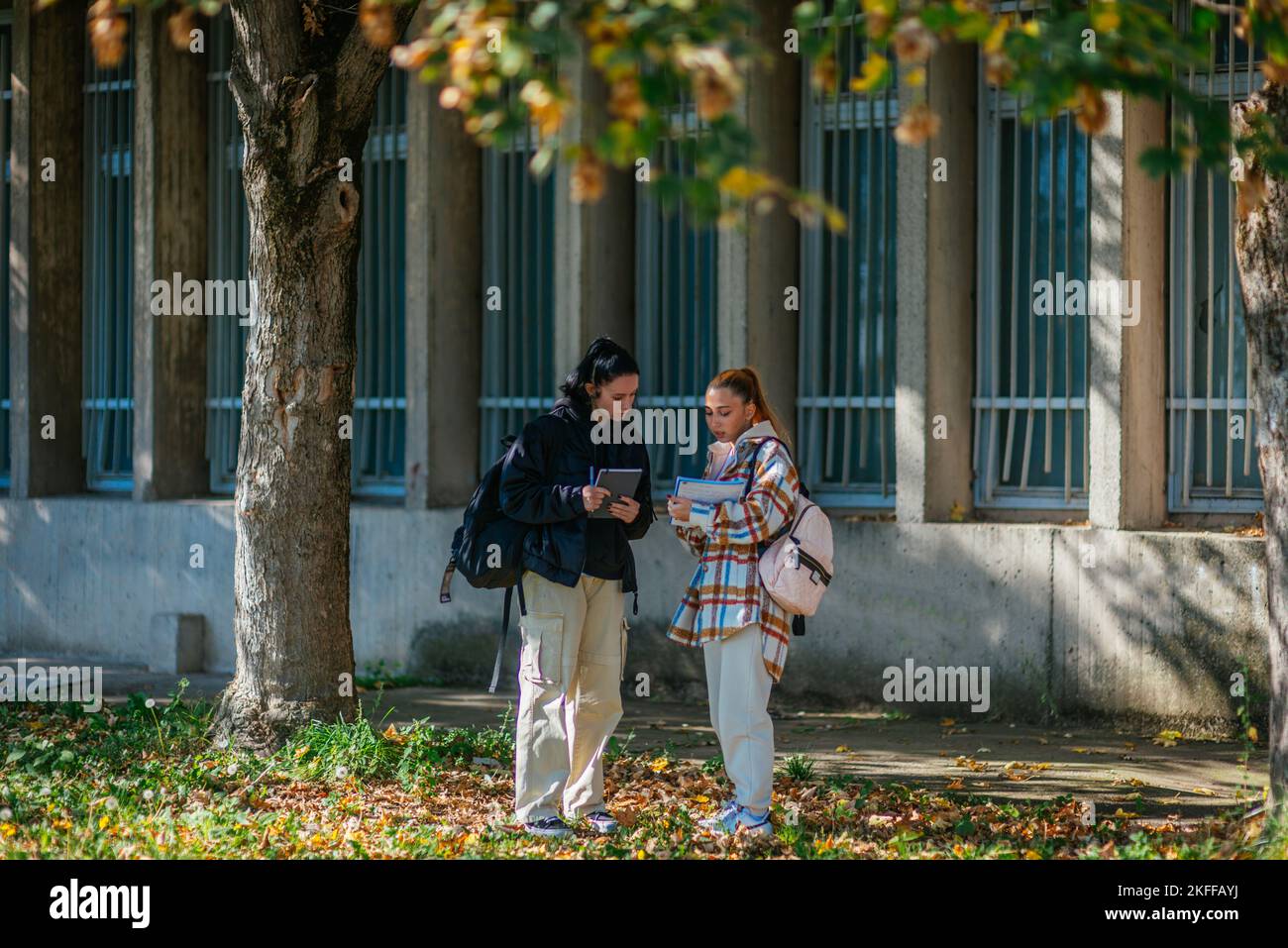 Two female students are talking about the exam coming up. They are ...