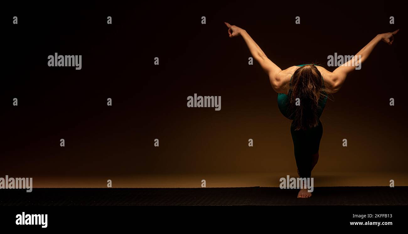 Attractive and beautiful young girl is doing some unusual pose Stock ...