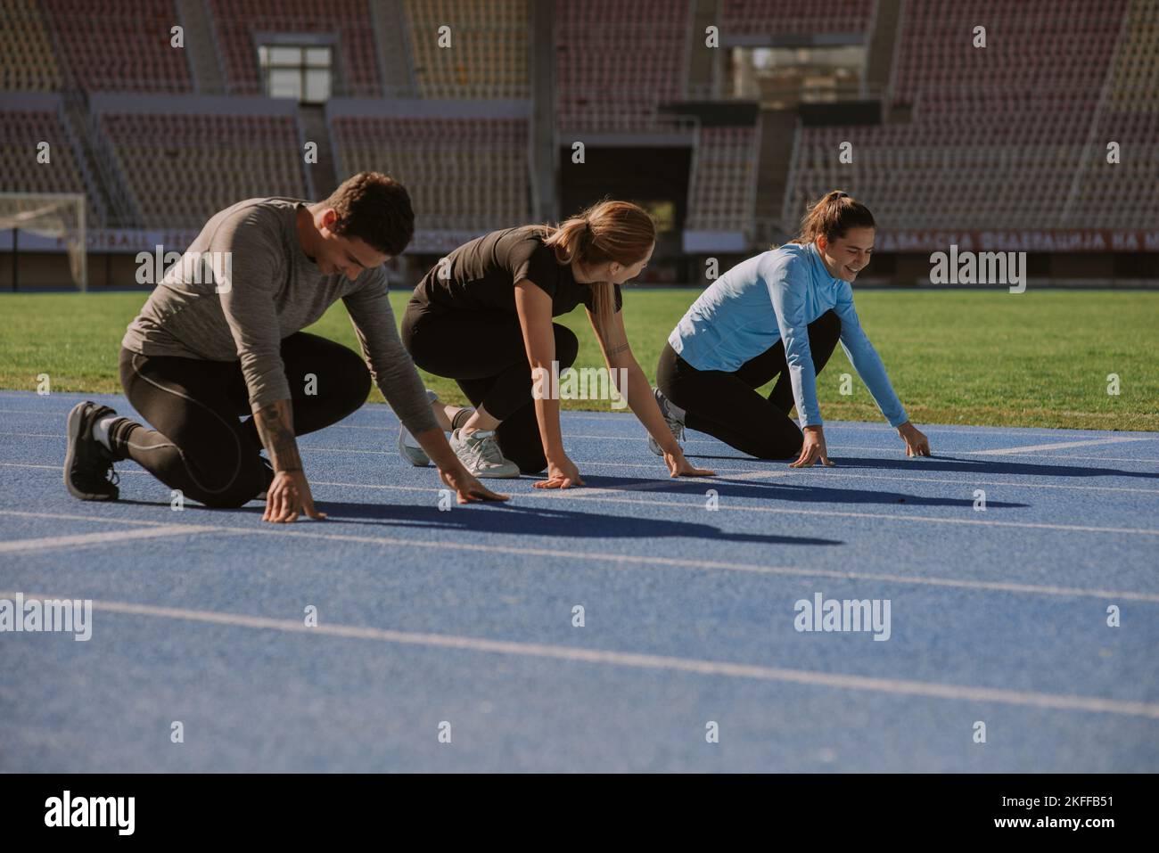 Three friends are training together. They are about to run a marathon ...