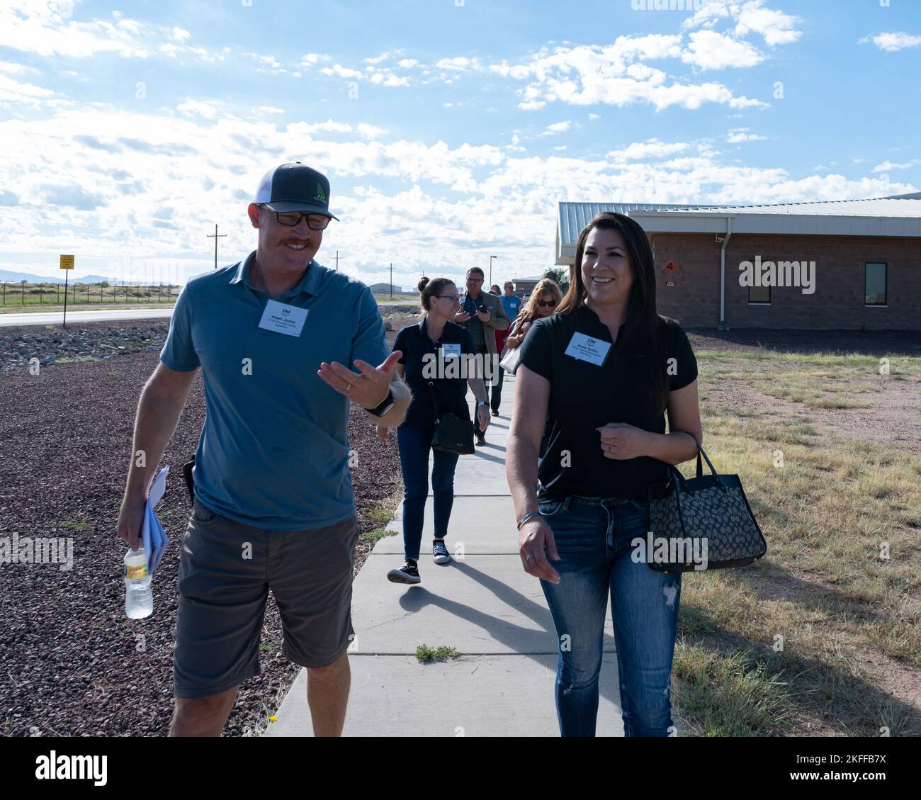 355th Honorary Commanders walk to the HC-130J simlulator building at ...