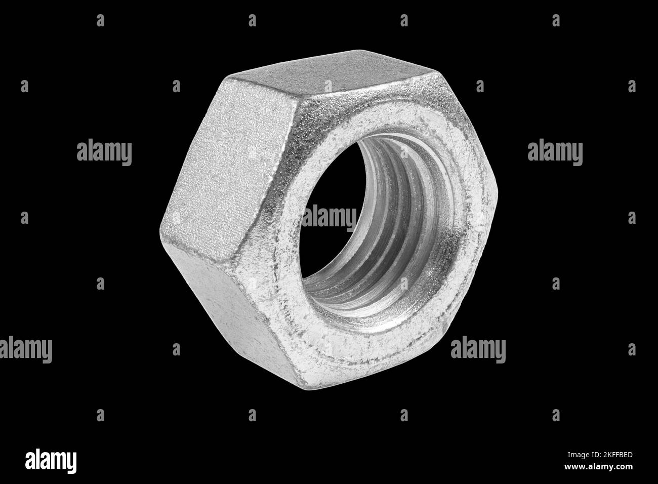 Macro shot metal nut isolated on black background. Chromed screw nut ...