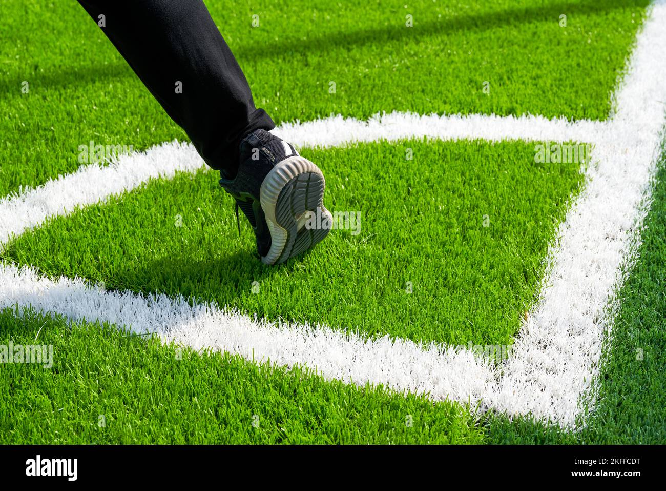 A player takes a corner kick on a brand new soccer field Stock Photo ...