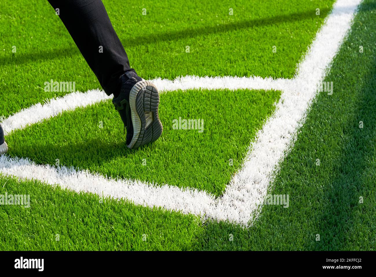 A player takes a corner kick on a brand new soccer field Stock Photo ...