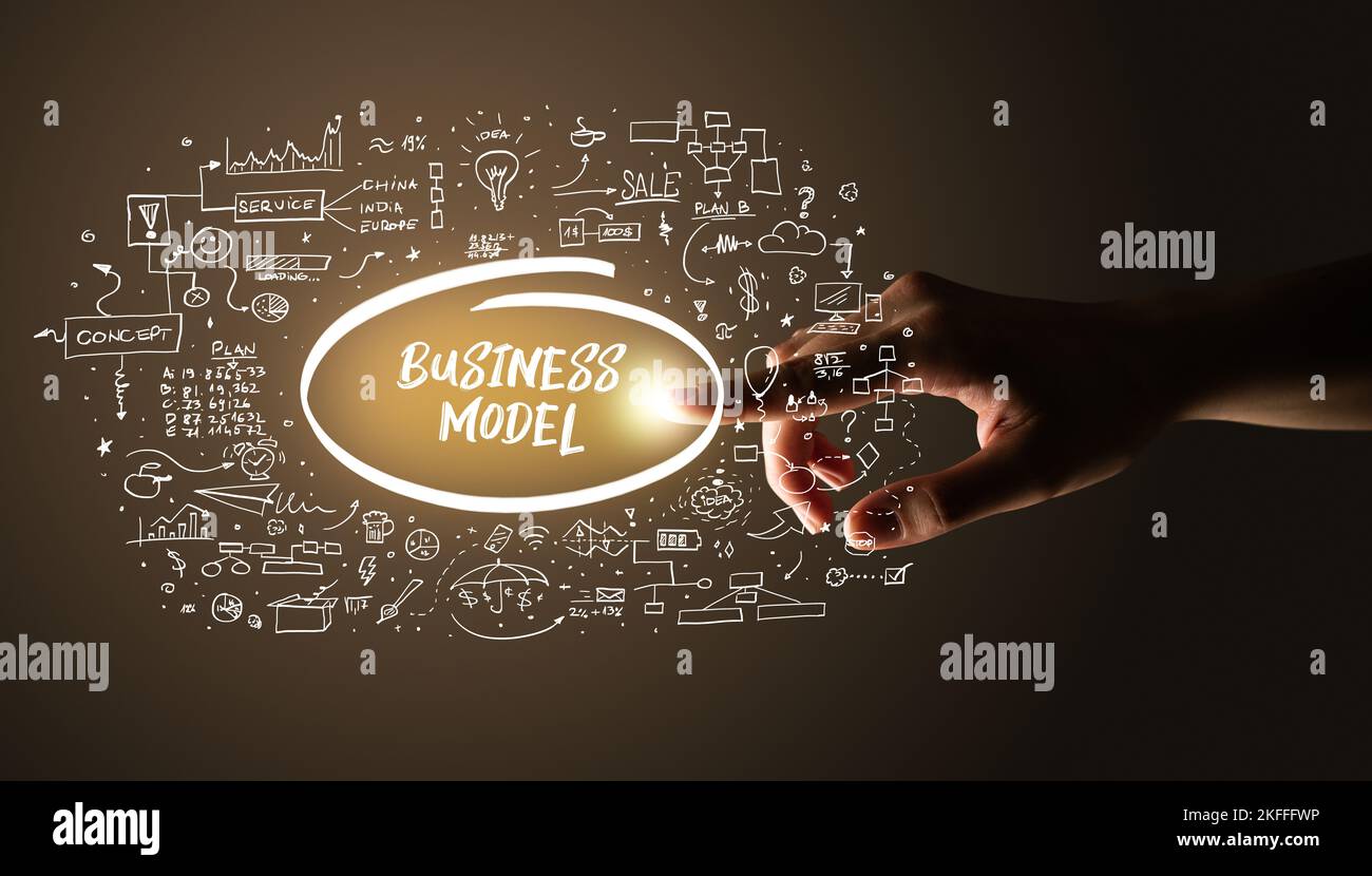 Hand touching hand drawn icons Stock Photo - Alamy