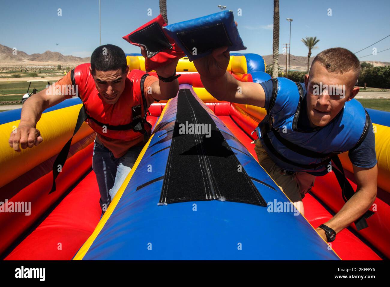 Left to right U.S. Navy Hospital Corpsman 3rd Class David Cagua and Pfc ...
