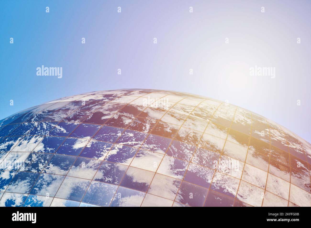 Earth planet modern building with clouds and blue sky in sunlight ...