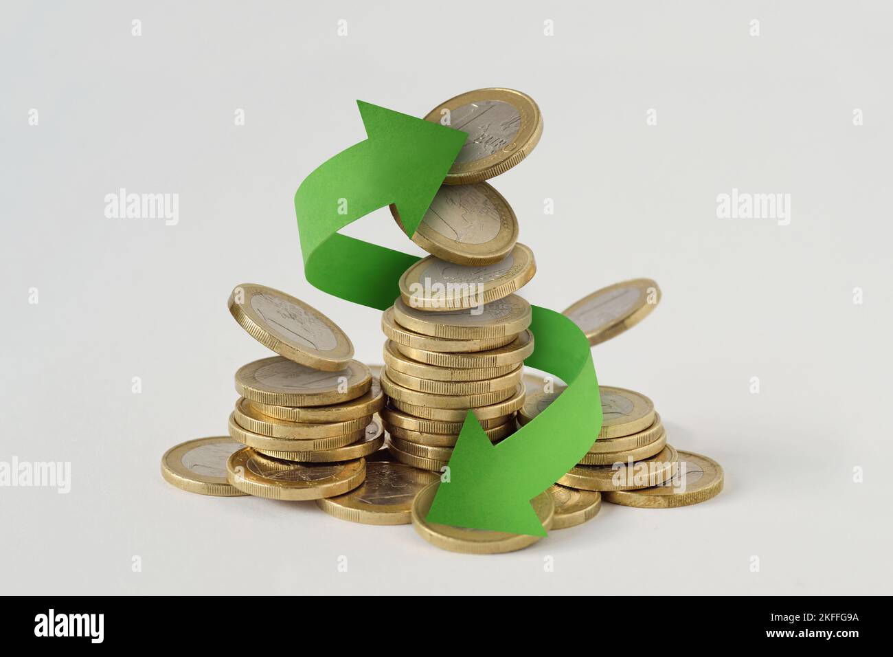 Euro coins stack with circle arrows - Concept of finance, cash back and ...