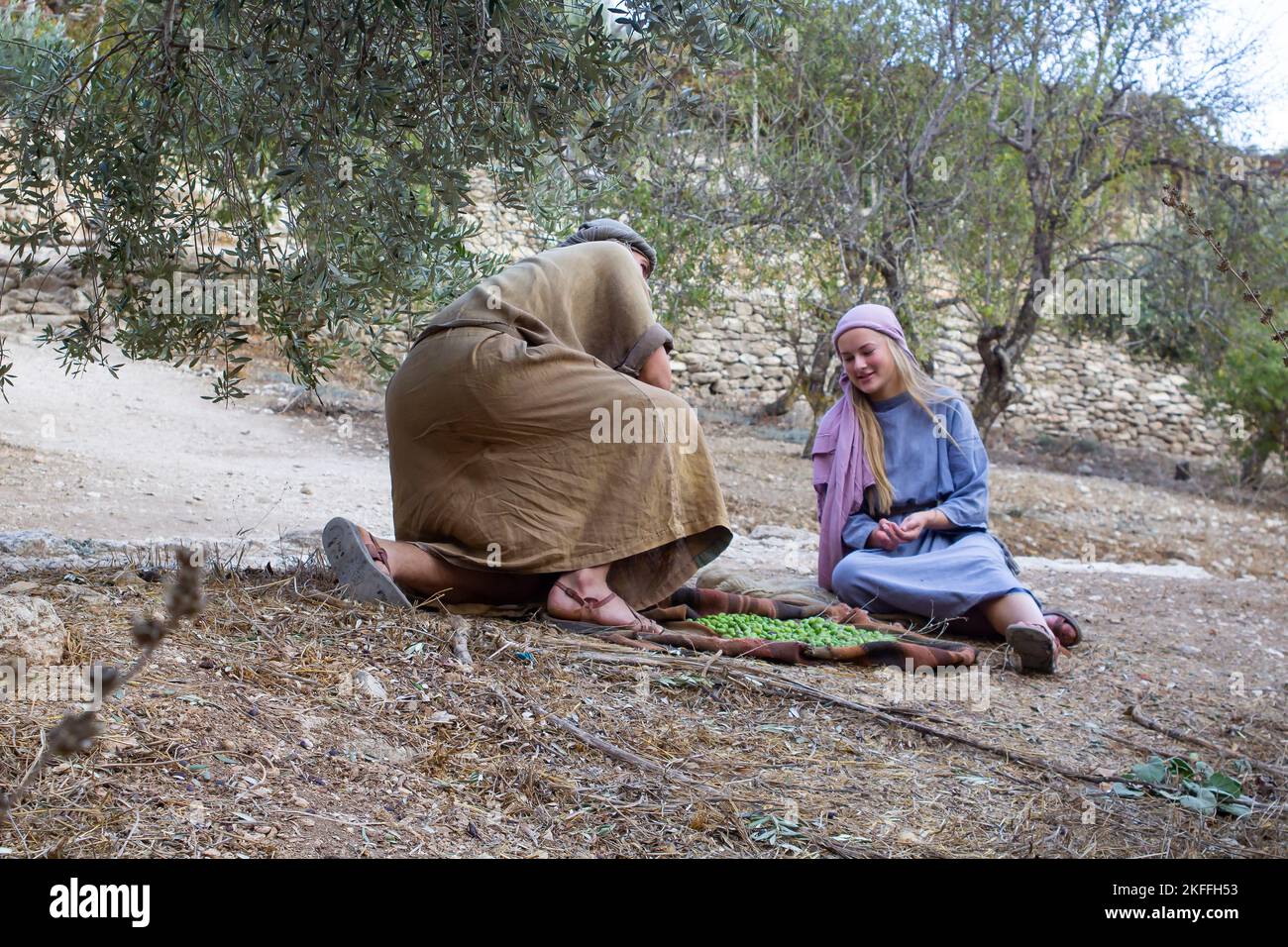 4 November 2022 A young couple in traditional clothing, grading ...