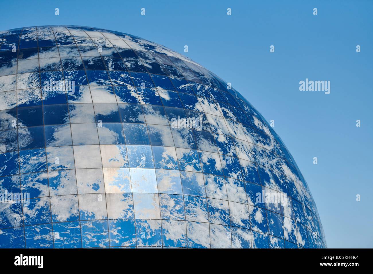 Earth planet modern building with clouds and blue sky, ecological ...