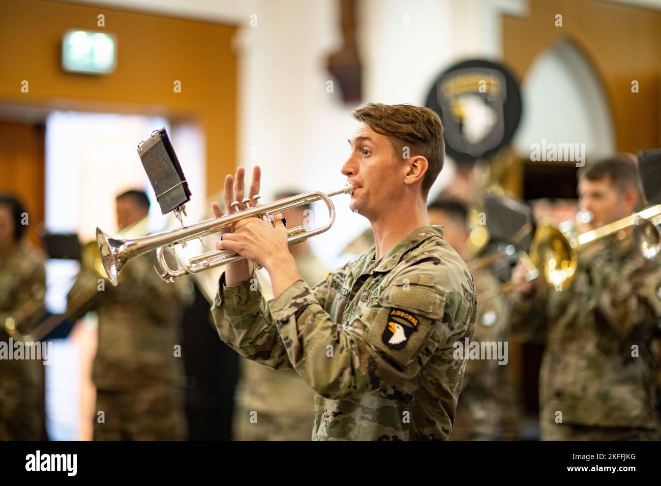 U.S. Army Spc. Tom Darlington, a musician with the 101st Airborne Division (Air Assault) Band ...