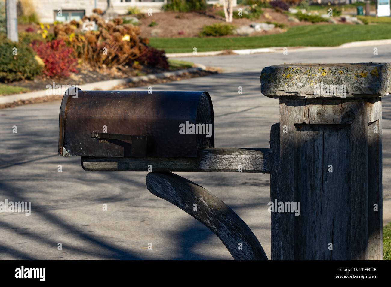 Old style mailbox sits ready for mail on a modern day street Stock ...