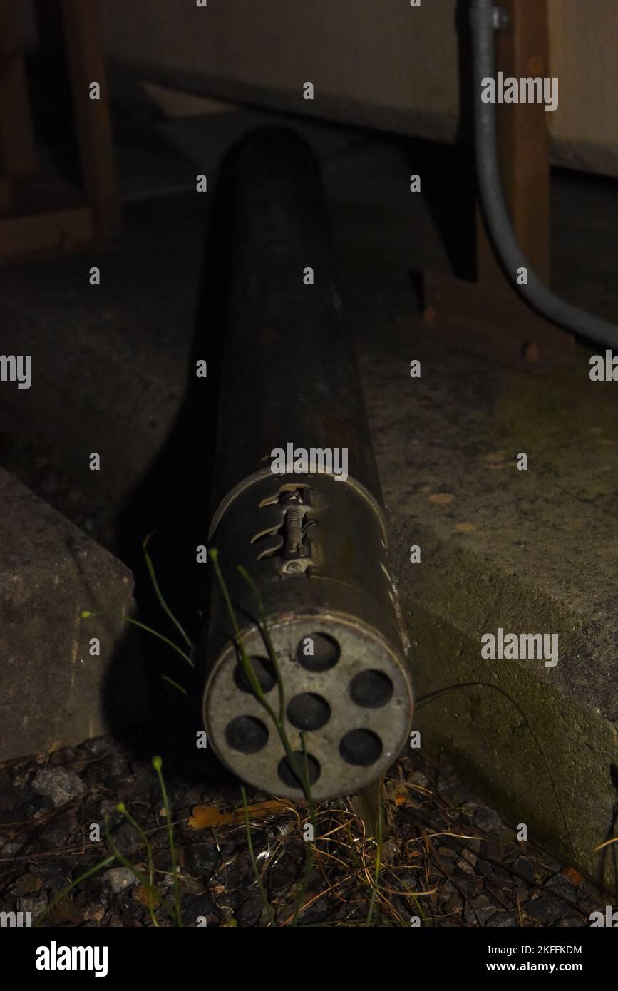 A simulated unexploded ordinance (UXO) awaits identification during a ...